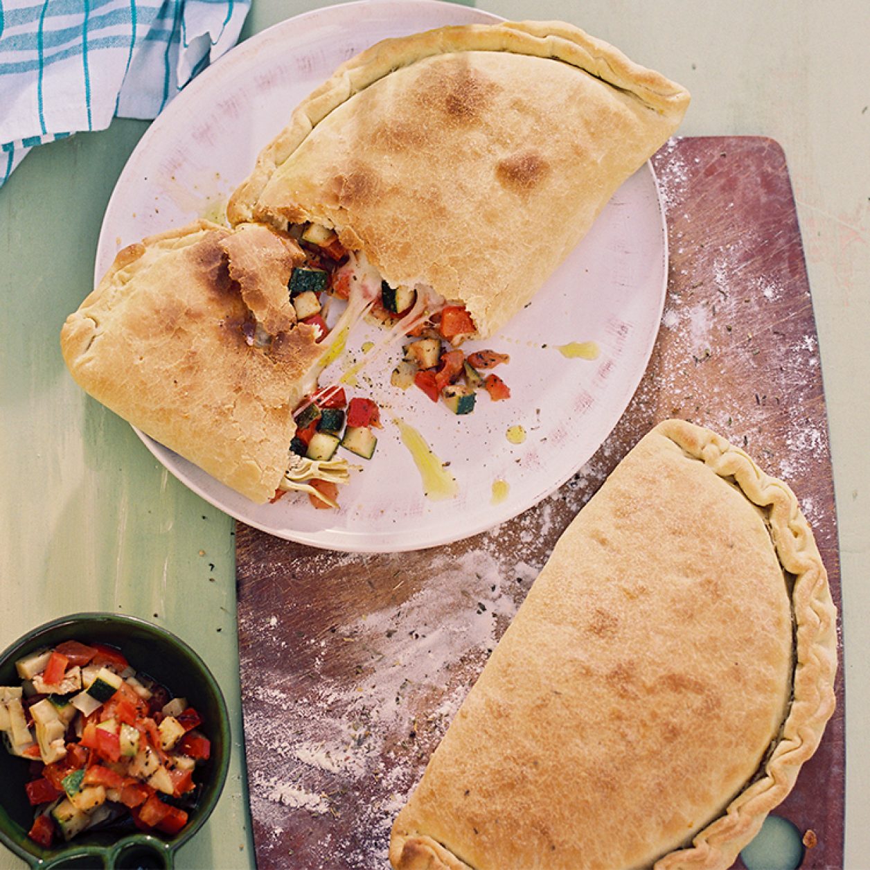 Zucchini, Artichoke, and Cheese Calzone | Savory