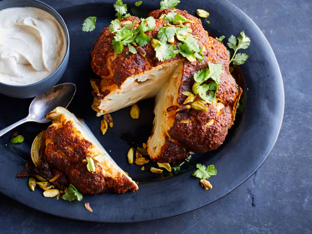Whole Roasted Cauliflower with Tahini Sauce | Savory Whole Roasted Cauliflower with Tahini Sauce | Savory