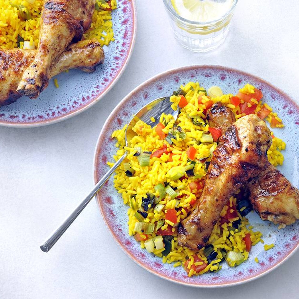 Grilled Chicken Drumsticks over Spanish Rice | Savory