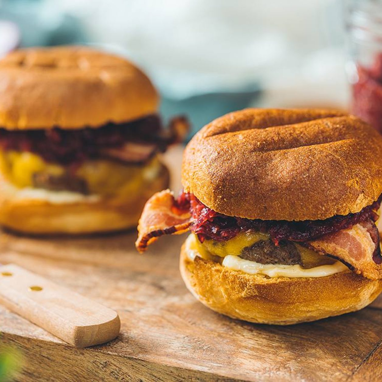 Canyon Bakehouse® Bacon Cheddar Burgers with Red Onion Jam | Savory