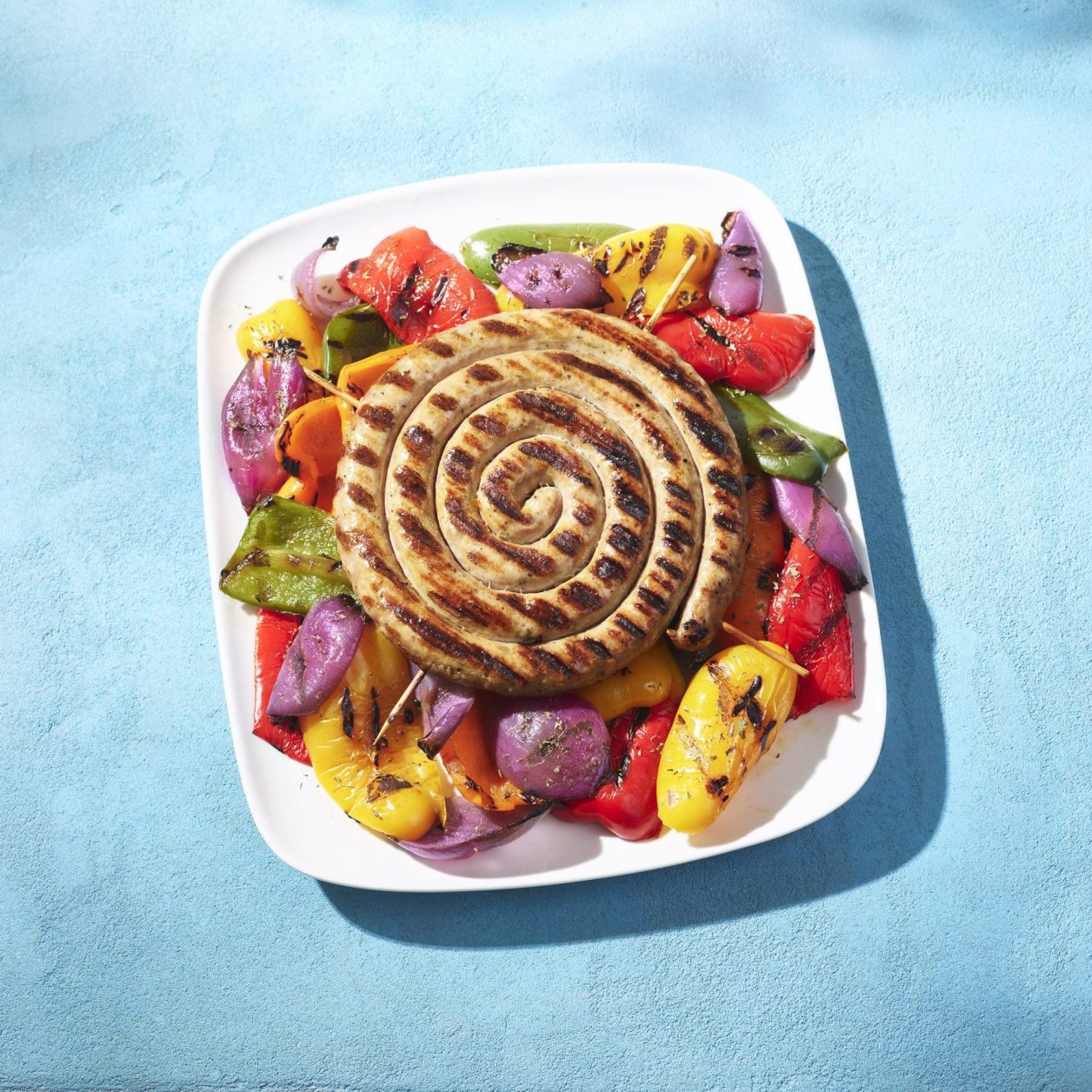 Grilled Sausage Rope with Peppers and Onions | Savory