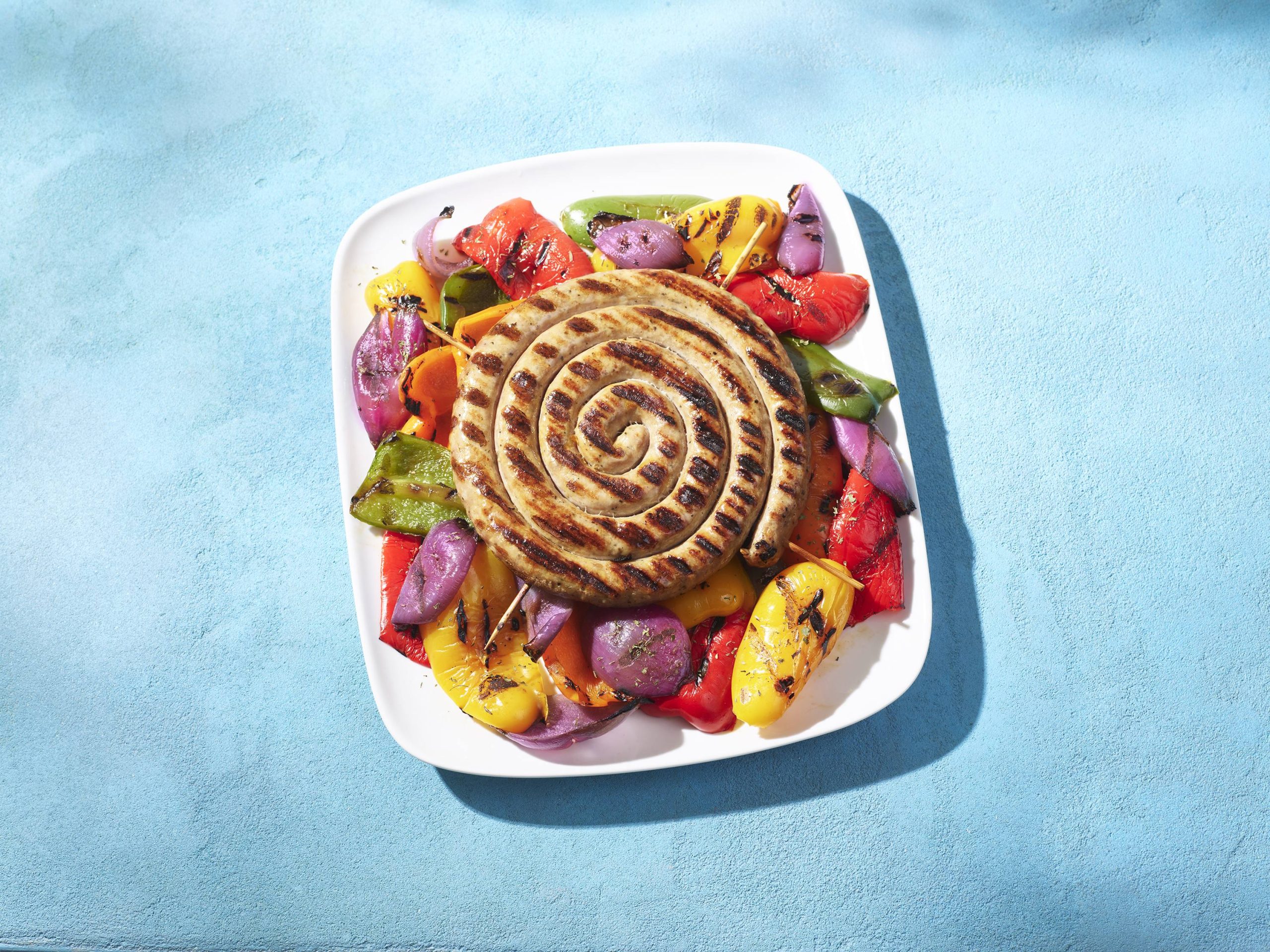 Grilled Sausage Rope with Peppers and Onions | Savory