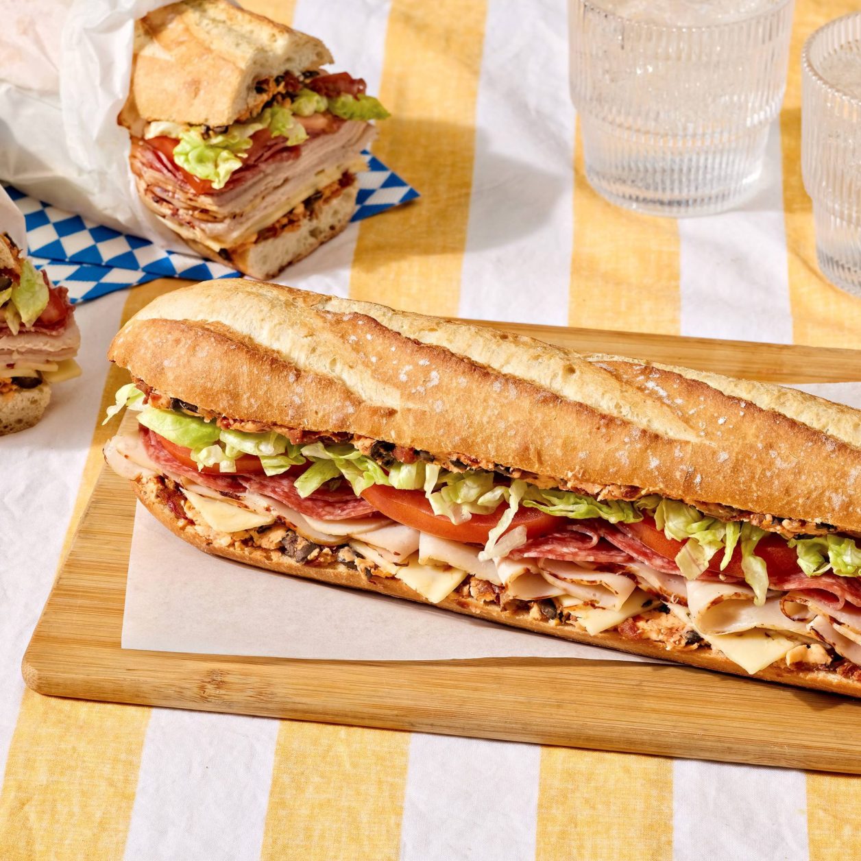 Turkey and Cheese Sub Sandwiches with Olive Butter | Savory