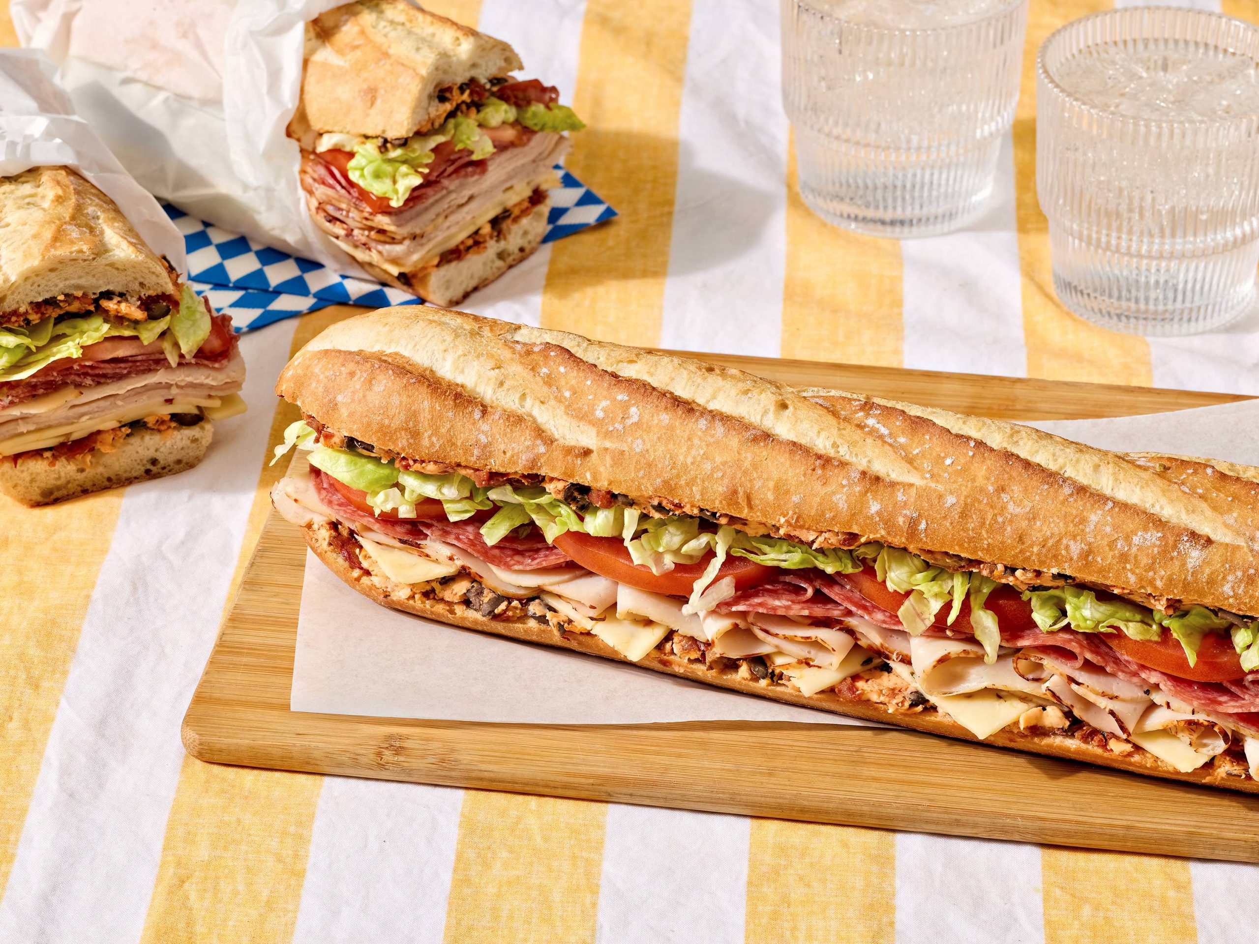 Turkey and Cheese Sub Sandwiches with Olive Butter | Savory