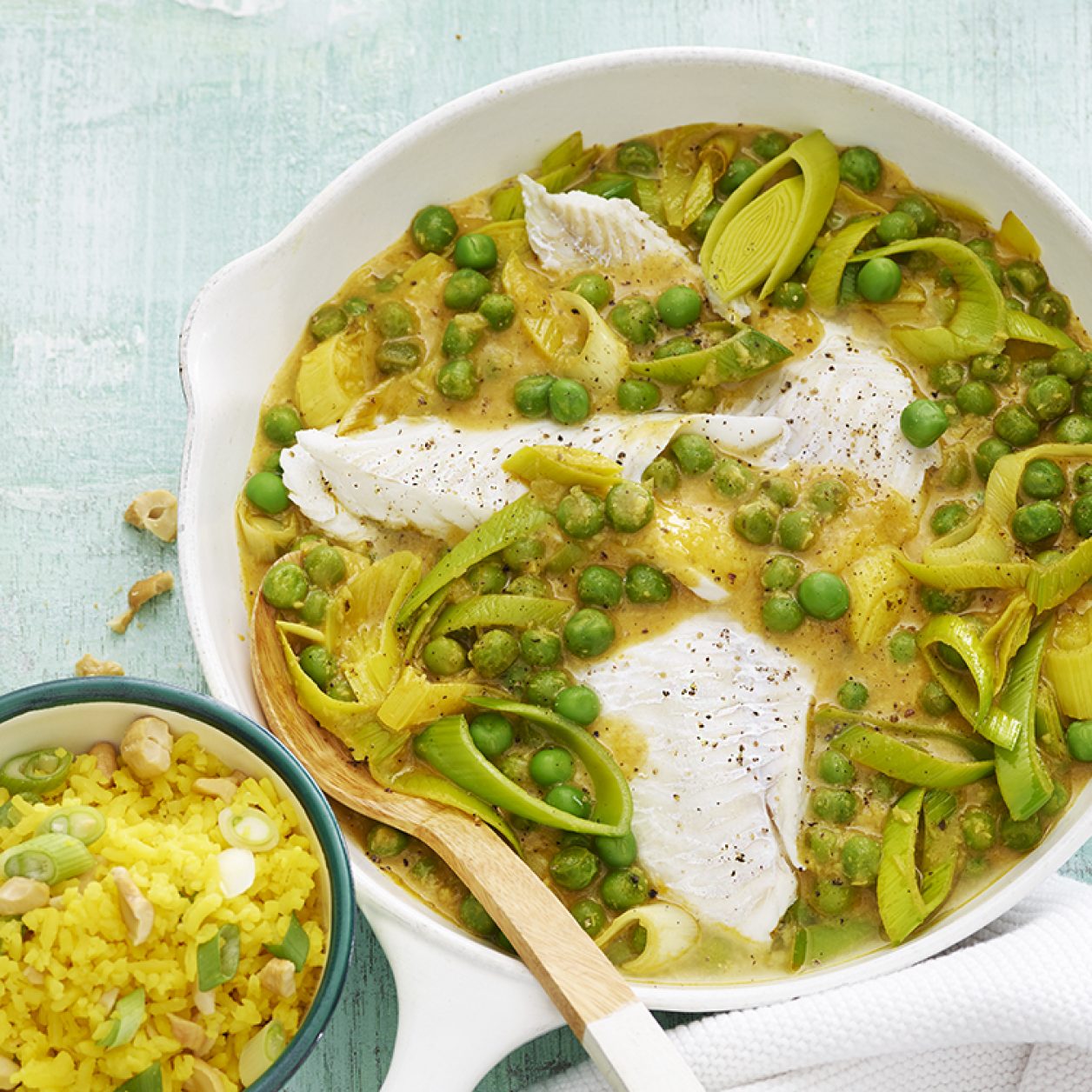 Curried Cod with Yellow Rice, Leeks, Peas and Scallions | Savory