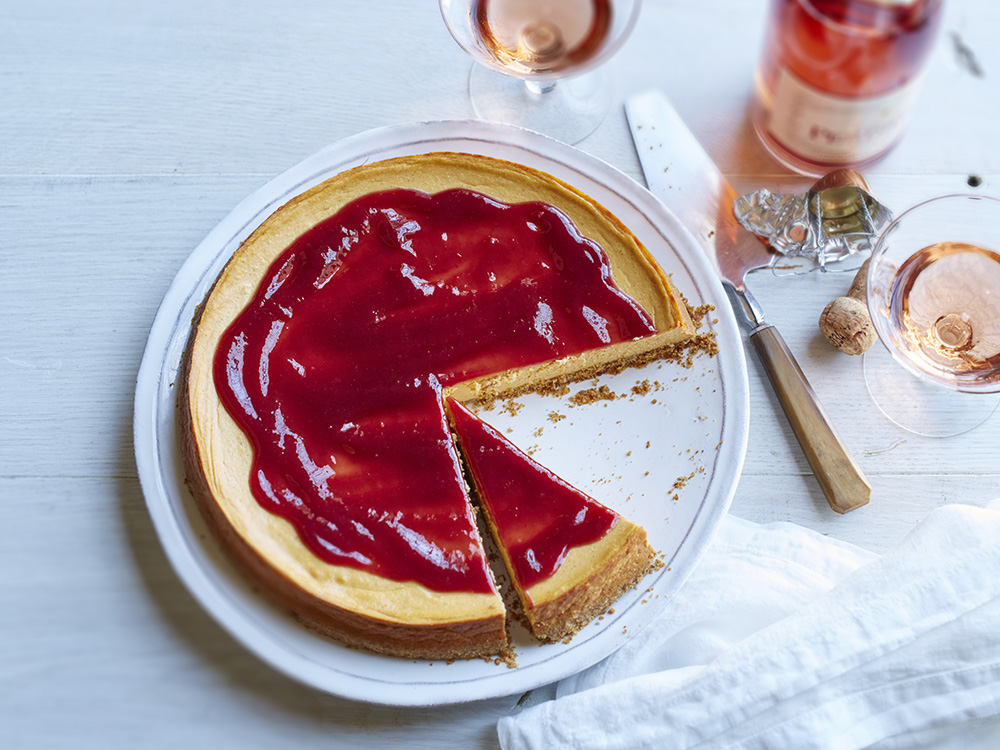 Pumpkin Cheesecake with Pretzel Crust and Raspberry Drizzle | Savory